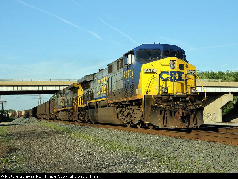 CSX 670 leads Westbound CSX E457 (empty coal train) off the Harbor Connecting track at CP128